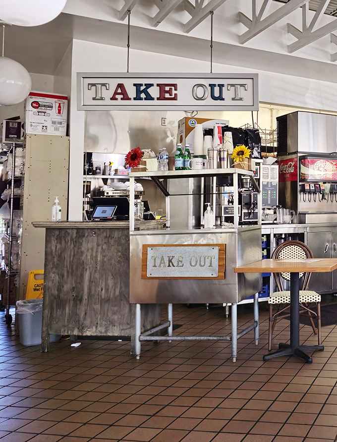 The "TAKE OUT" sign&mdash;six letters that translate to "breakfast joy can travel with you" in any language.