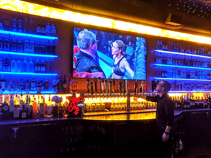 The bar's vibrant blue lighting and impressive screen make it impossible to miss a game &ndash; or an excuse to order another round.