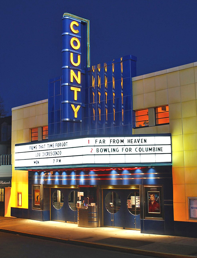 The County Theater's neon glow makes every movie feel like a premiere worth dressing up for.