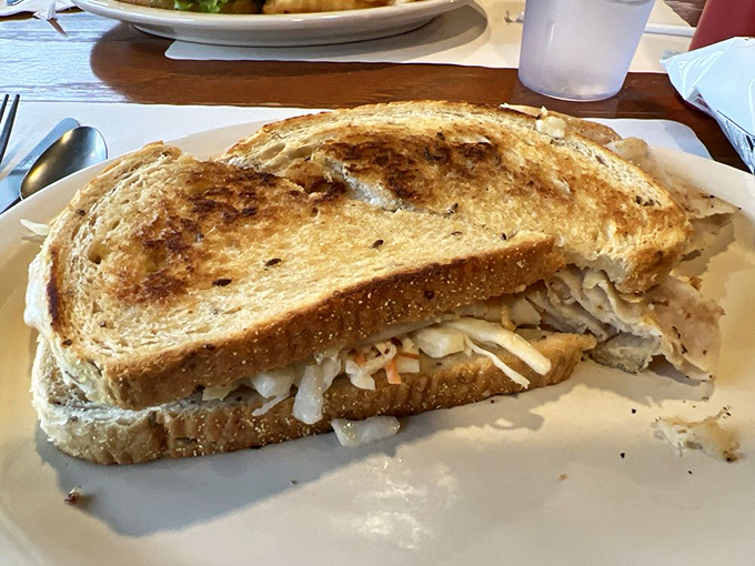 The Rachel sandwich: like meeting your favorite sandwich's equally charming cousin. That toasted bread is the sound of happiness.