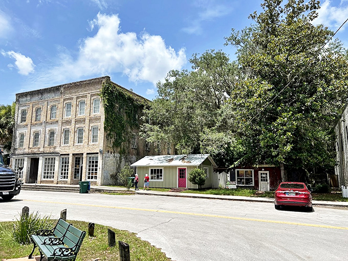 The Thrasher Warehouse stands as a wooden testament to Florida before air conditioning – when buildings breathed through wooden slats and high ceilings.