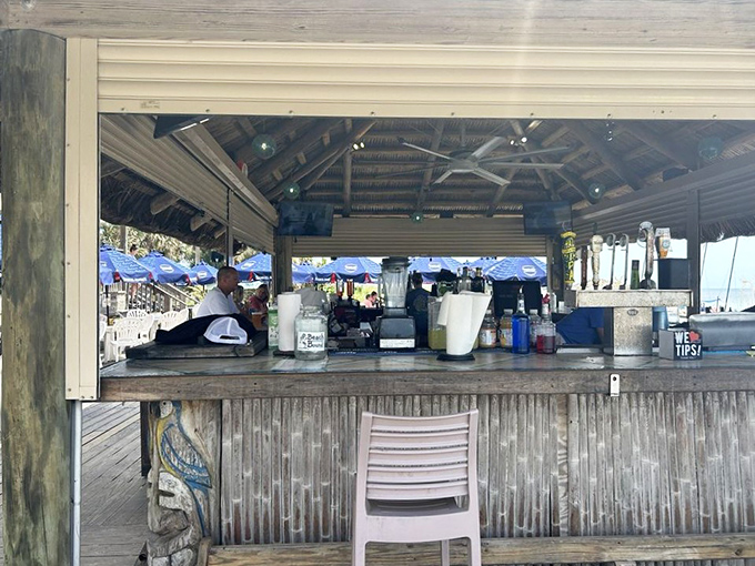 The tiki bar where memories are made&mdash;corrugated metal, weathered wood, and bartenders who've heard every fishing story twice.