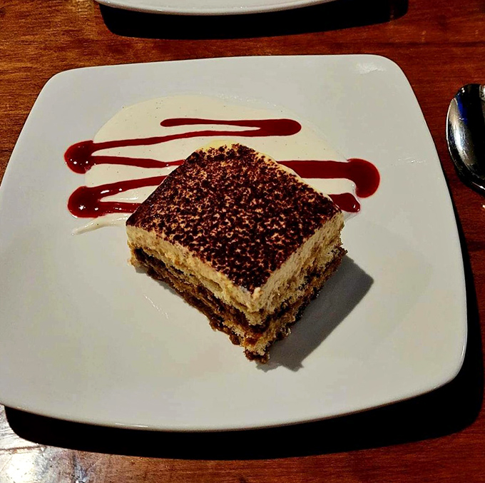 This tiramisu isn't just dessert&mdash;it's architecture. Precise layers of coffee-soaked ladyfingers and mascarpone create the Manhattan skyline of sweet endings.