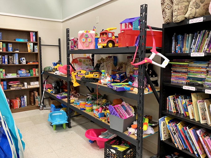 The toy section – where plastic dinosaurs and dolls patiently wait for imagination to bring them back to life.