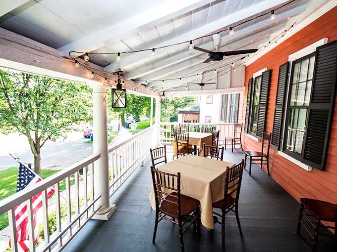 This inviting veranda beckons guests to relax and perhaps contemplate the inn's many unexplained mysteries.