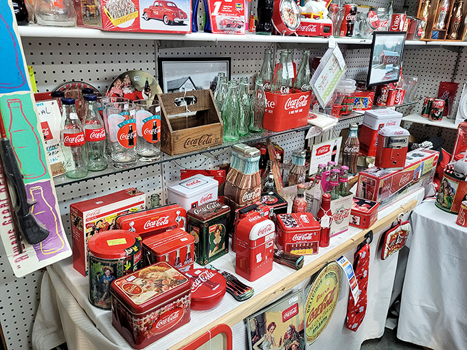 Coca-Cola collectibles create a shrine to American nostalgia. That distinctive red pulls you in like a fizzy, caffeinated tractor beam.