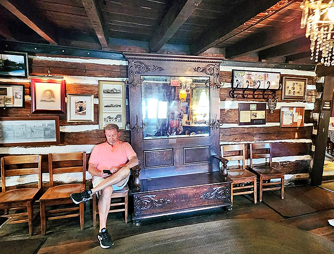The waiting area doubles as a living museum of Stroud's history. Those wooden chairs have supported countless hungry patrons over the years.
