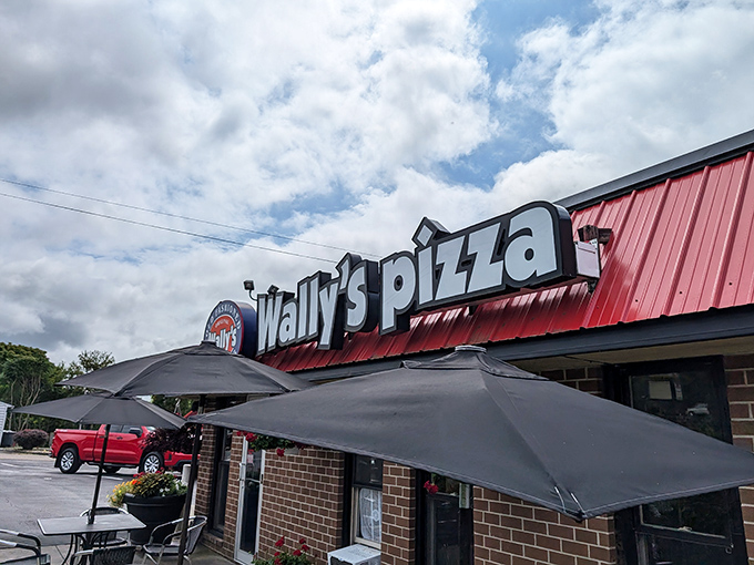 Wally's Pizza&mdash;where the red roof promises comfort food that won't judge you for ordering extra cheese, and neither will we.