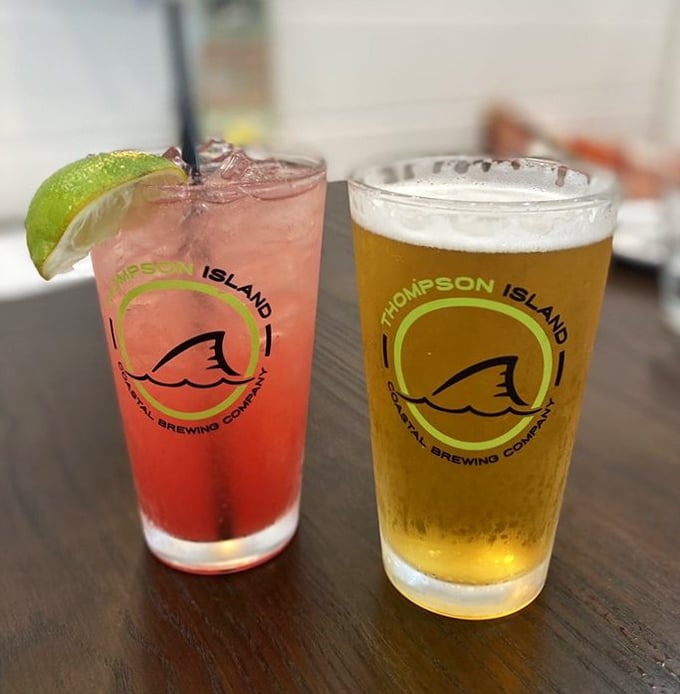 Vacation in a glass: a watermelon cocktail that tastes like summer memories, alongside a perfectly poured local brew.