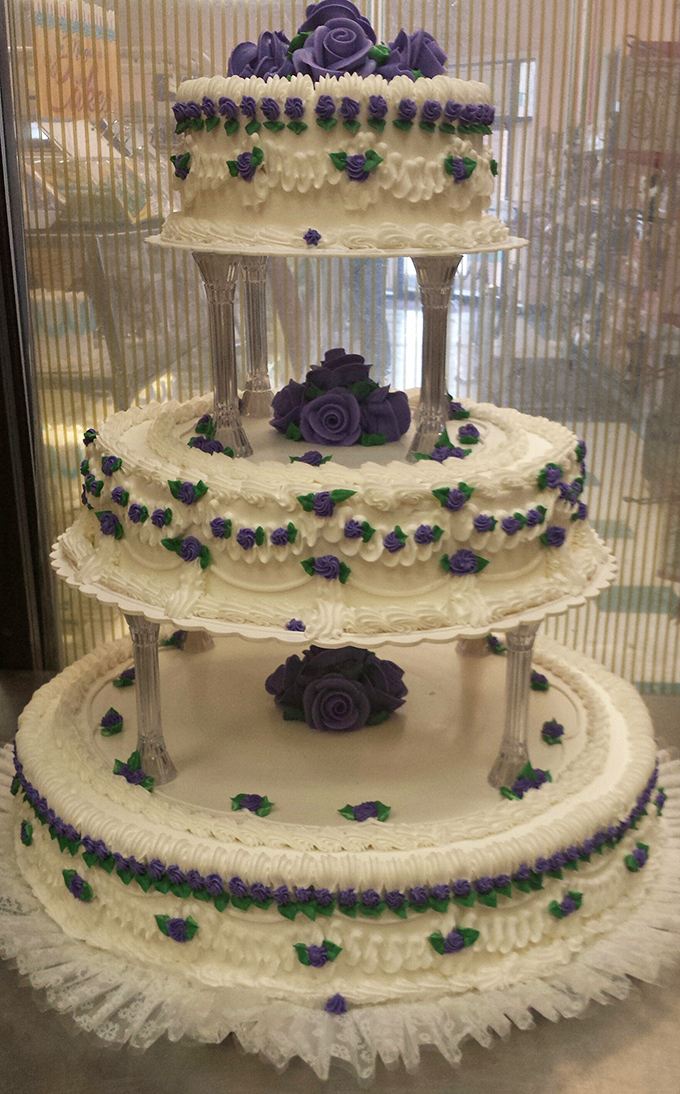 A wedding cake so elegant it deserves its own spotlight and red carpet entrance.