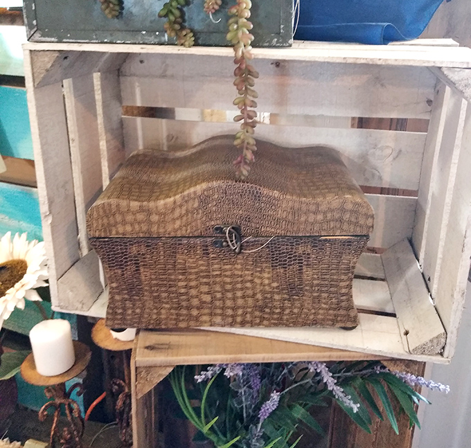 This textured wicker treasure chest isn't just storage&mdash;it's a promise of secrets kept and memories preserved in tactile vintage form.