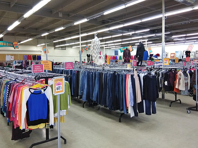 Ladies' fashion paradise unfolds in organized chaos where designer dreams meet thrifty reality perfectly.