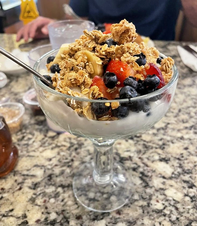 Fresh yogurt parfait offering a lighter option that doesn't compromise on flavor or satisfaction.