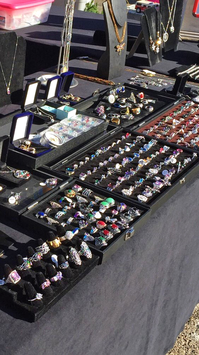 Jewelry displays glitter like a pirate's treasure chest, minus the curse but with all the sparkle.