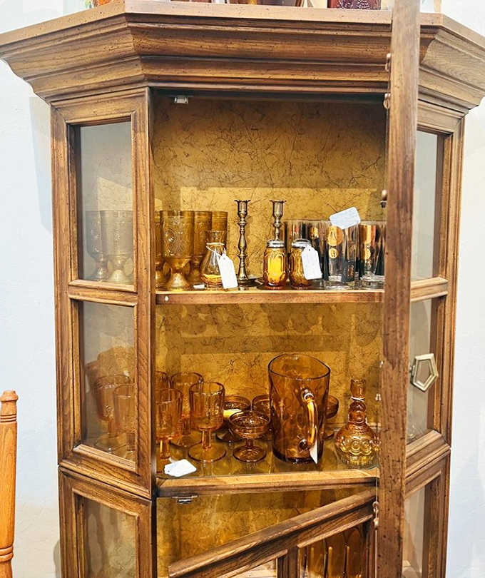 Amber glassware gleams behind oak and glass, waiting to hold everything from bourbon to that fancy lemonade recipe you've been meaning to try.