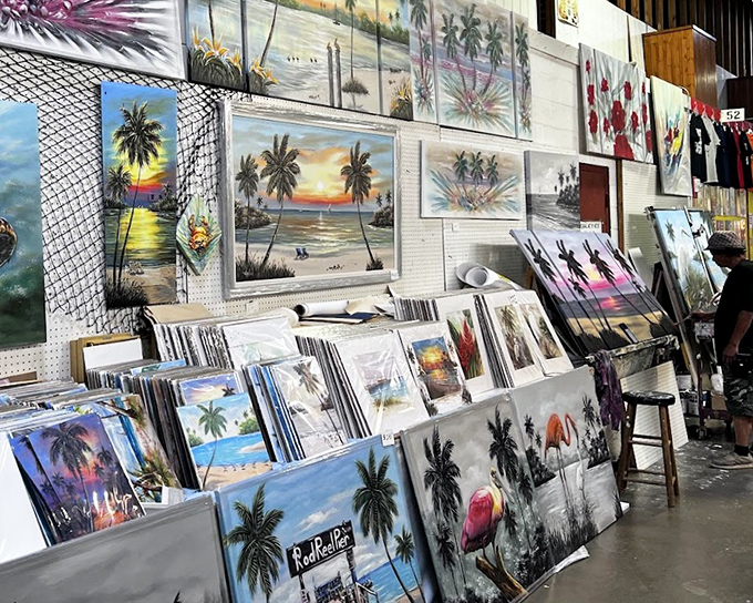 Florida sunset paintings line the walls like windows to paradise, each one promising to match someone's living room couch perfectly.