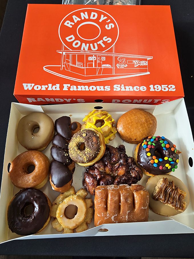 Not so much a donut box as a treasure chest. Indiana Jones would swap his golden idol for this collection any day.