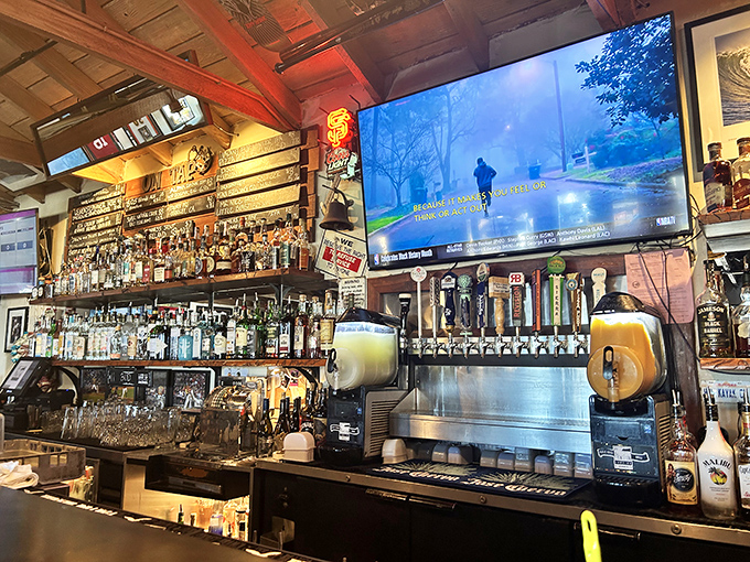 A back bar stocked like a pirate's treasure chest. Whatever your spirit of choice, it's waiting for you here among the weathered wood and warm lighting.