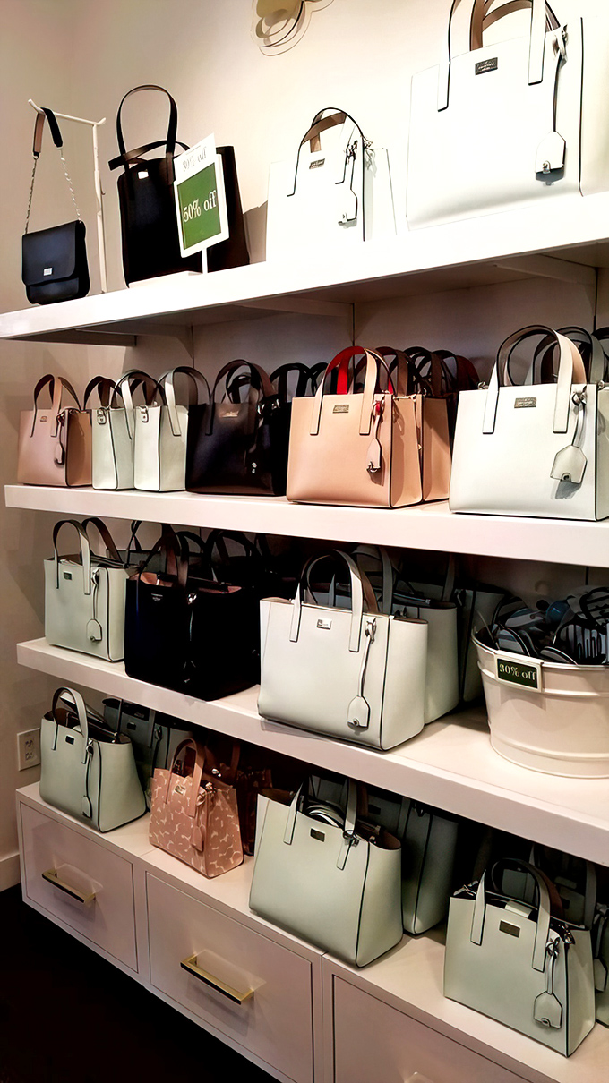 Kate Spade handbags lined up like soldiers ready for deployment to your closet. The 50% off sign is practically begging you.