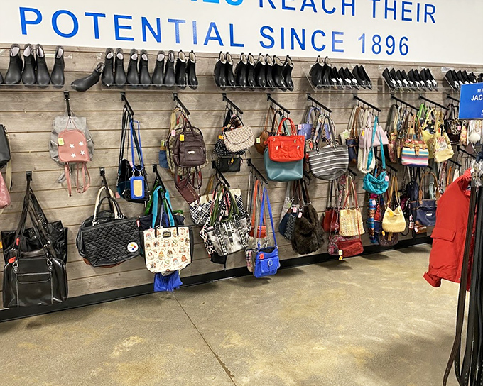 The handbag wall showcases a rainbow of purses and totes&mdash;each one previously loved but ready for new adventures on someone else's arm.