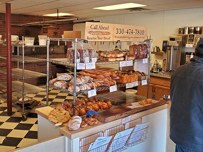 This isn't just a display case&mdash;it's a treasure chest of carbohydrate jewels. Each loaf and pastry waits patiently for its forever home.
