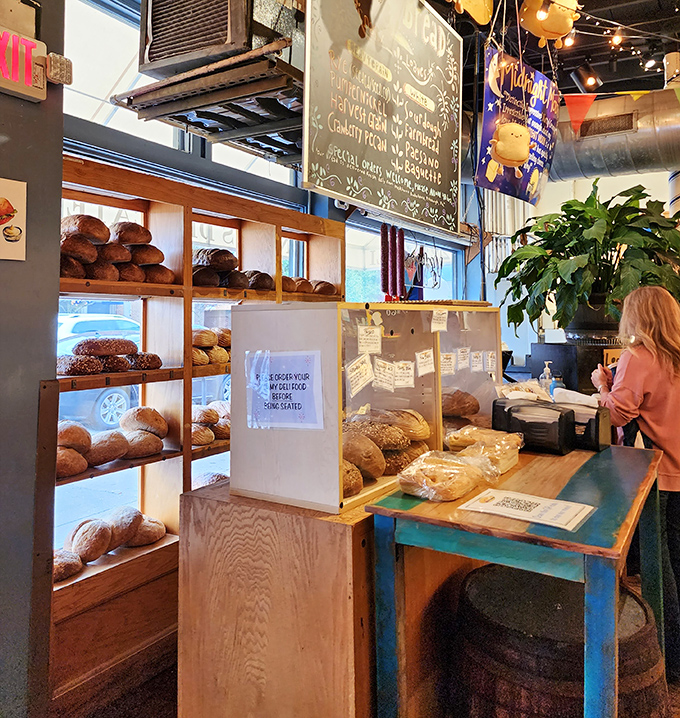The bread display&mdash;where carb dreams come true and diet plans go to die, gloriously and without regret.