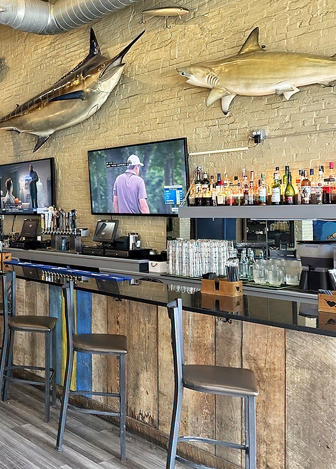The bar where fish stories get better with each drink. Mounted catches on the wall remind you where your dinner came from—the wild, not a factory.