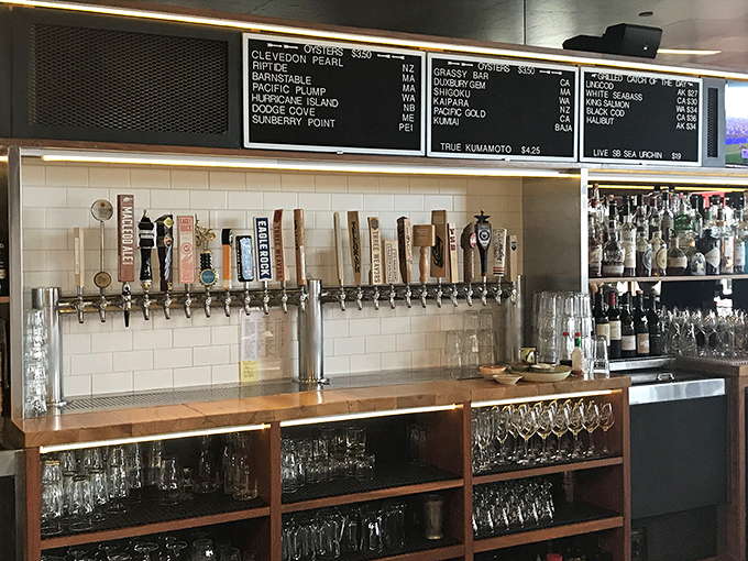 The bar's chalkboard proudly displays oyster varieties like a professor's prized lecture notes. Each sip pairs with stories from distant shores.