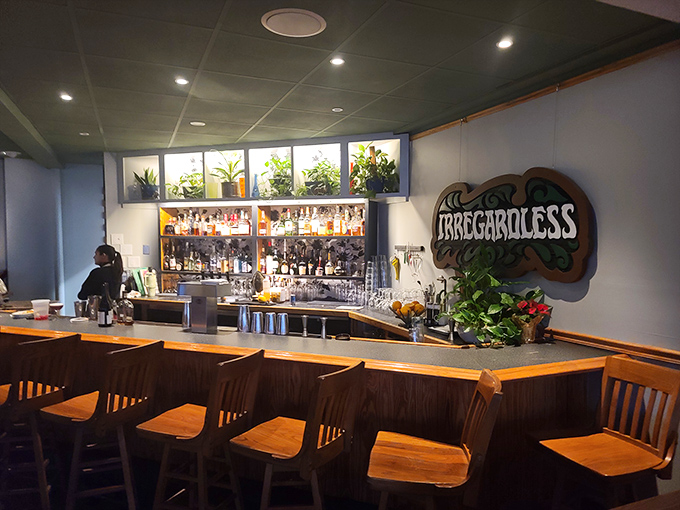 A bar that strikes the perfect balance&mdash;enough bottles to intrigue but not intimidate, with plants overhead suggesting your liver might actually survive.