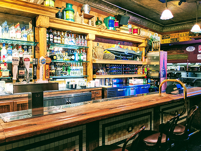 A bar that understands priorities: good spirits, good company, and the promise of seafood just steps away from your barstool.