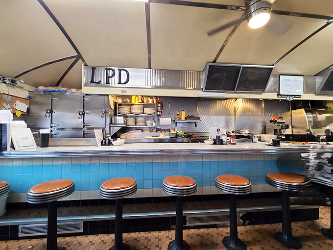 The open kitchen setup isn't just practical&mdash;it's dinner theater where short-order cooking becomes performance art with the sizzle as soundtrack.