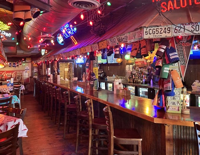 This bar has seen stories told, friendships formed, and countless "just one more" moments. License plates on the wall track visitors from afar. 