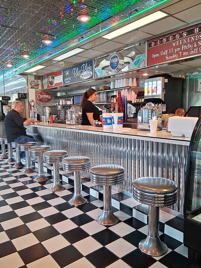 At this altar of American dining, chrome stools await pilgrims seeking salvation in the form of blue plate specials and friendly conversation.