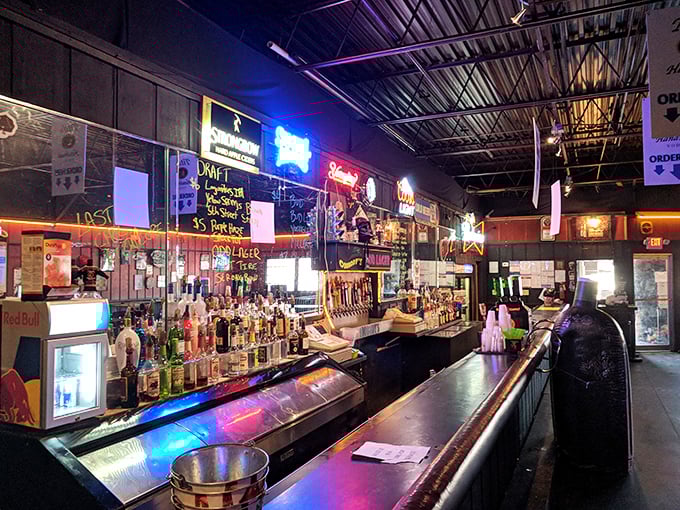 A bar that's seen more stories than a librarian. The neon glow promises cold drinks and judgment-free zones. 