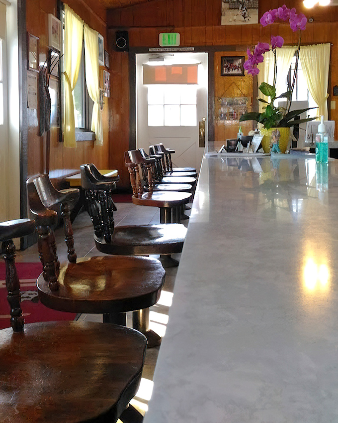 Counter seats where life's problems get solved over coffee and the perfect burger.