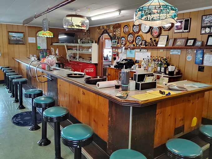 The classic tavern bar where locals gather to share stories, cold drinks, and insider tips about tomorrow's catch.