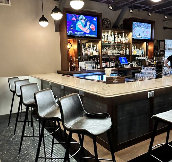 Where conversations flow as smoothly as the drinks in this perfectly appointed gathering spot.