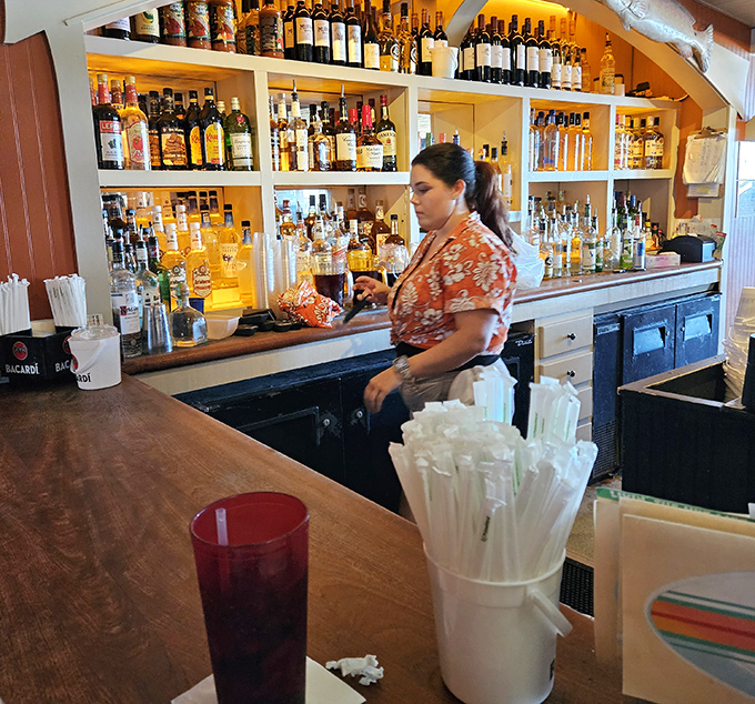 The bar area where locals gather to share fishing tales over cold drinks and laughter.