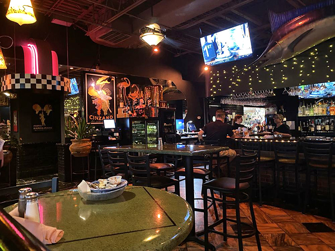 The bar area where your drink arrives faster than you can say "lobster."