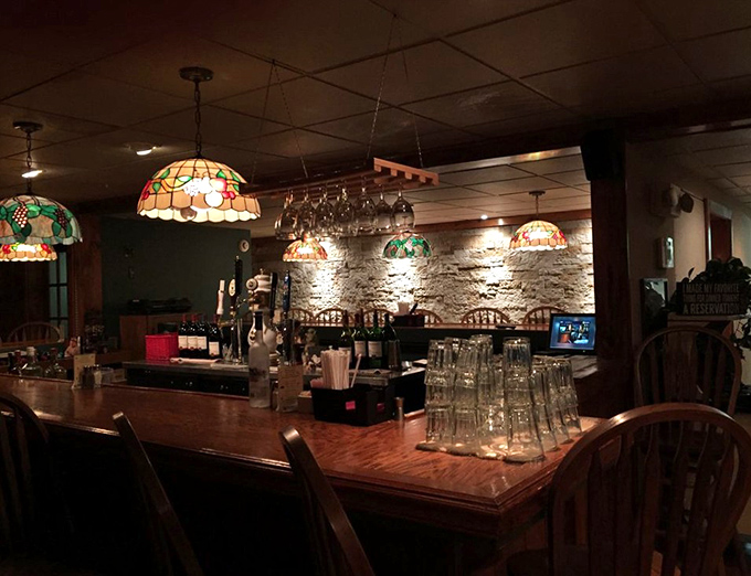 This isn't just a bar&mdash;it's a stage where liquid happiness is crafted beneath the glow of stained glass lamps and stone walls.