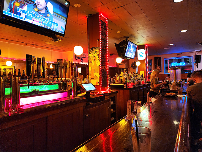 The bar glows with neon promise as taps stand ready. Cleveland's craft beer scene meets creative hot dogs in a marriage made in culinary heaven.