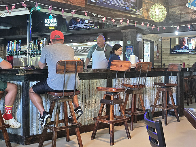 The bar&mdash;where strangers become friends and locals share their island secrets. Those wooden stools have supported countless happy hours and fishing tales.
