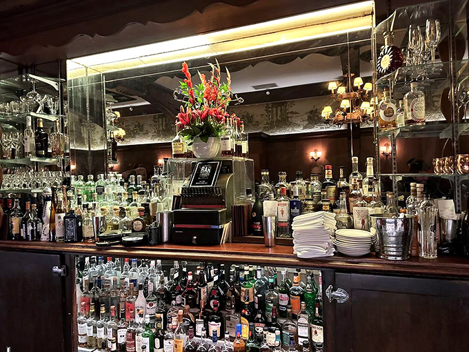 Behind this bar, mixologists craft cocktails with the precision of film editors, each bottle a potential character in your evening's story.