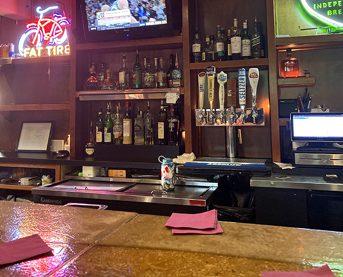 A bar that says "pull up a stool and tell me your fishing stories." Wood paneling and well-stocked shelves promise good times and better drinks.