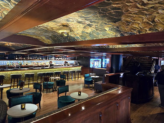 The bar's undulating ceiling mimics ocean waves, while the bartenders craft cocktails that would make old sea captains proud. Permission to come aboard granted.