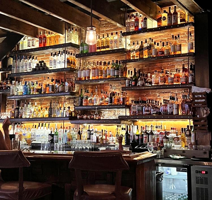 Behind every great meal is a great bar. This impressive wall of spirits promises cocktail magic for every palate.