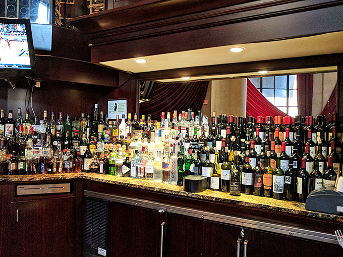 A backbar that would make a sommelier weep with joy. More bottles than your home collection, unless you're Sting or Oprah.
