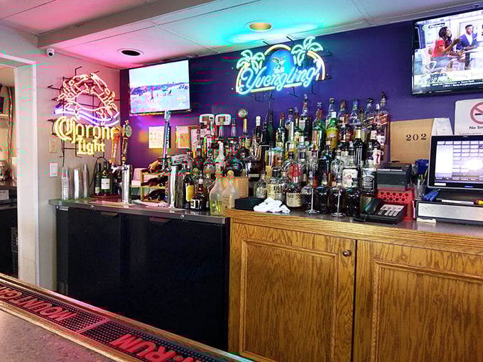 The bar's neon glow promises good times ahead, with enough spirits to keep the conversation flowing as smoothly as the Chesapeake tides.