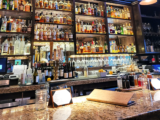 A bar stocked so thoroughly it looks like it's preparing for prohibition's return. Whatever your spirit of choice, they've got you covered &ndash; probably twice.