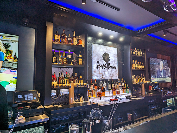 A bar stocked for serious business, with lighting that makes everyone look like they're in a bacon-themed music video. Priorities firmly established.